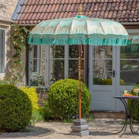 25 Garden Parasols To Glam Up Your Garden This Summer