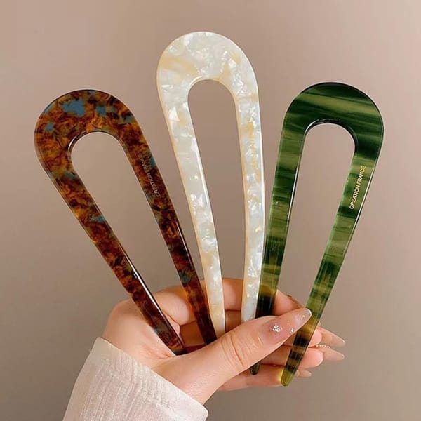 The French Twist Is Set To Replace The Slicked-Back Bun - The Handbook